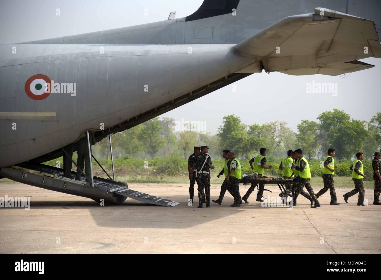 IAF (Indian Air Force) worker shift injured people to Hercules-130J as ...