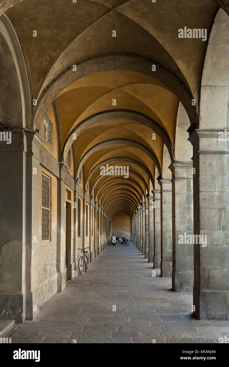 Arched passageway view house hi-res stock photography and images - Alamy