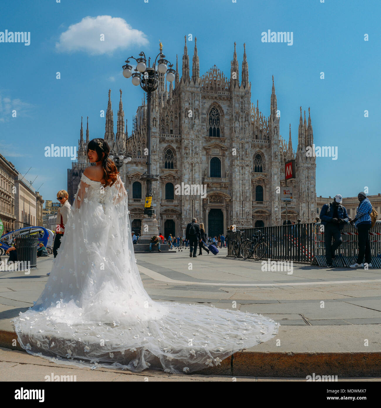 Milan, Italy - April 17, 2018: Newly married sole Asian female bride ...