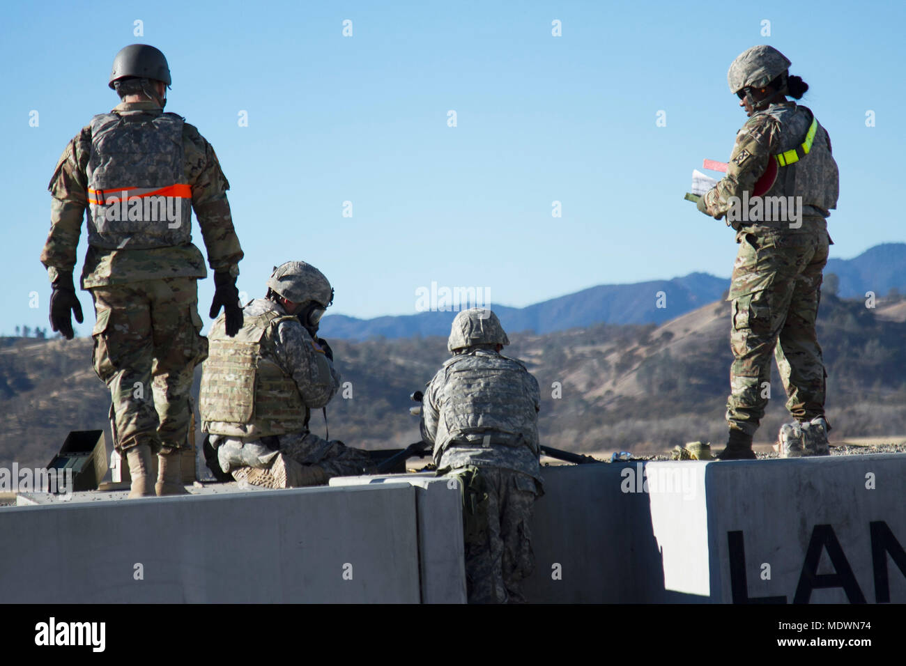 U.S. Army Reserve Soldiers serving on a two-man team as gunner and ...