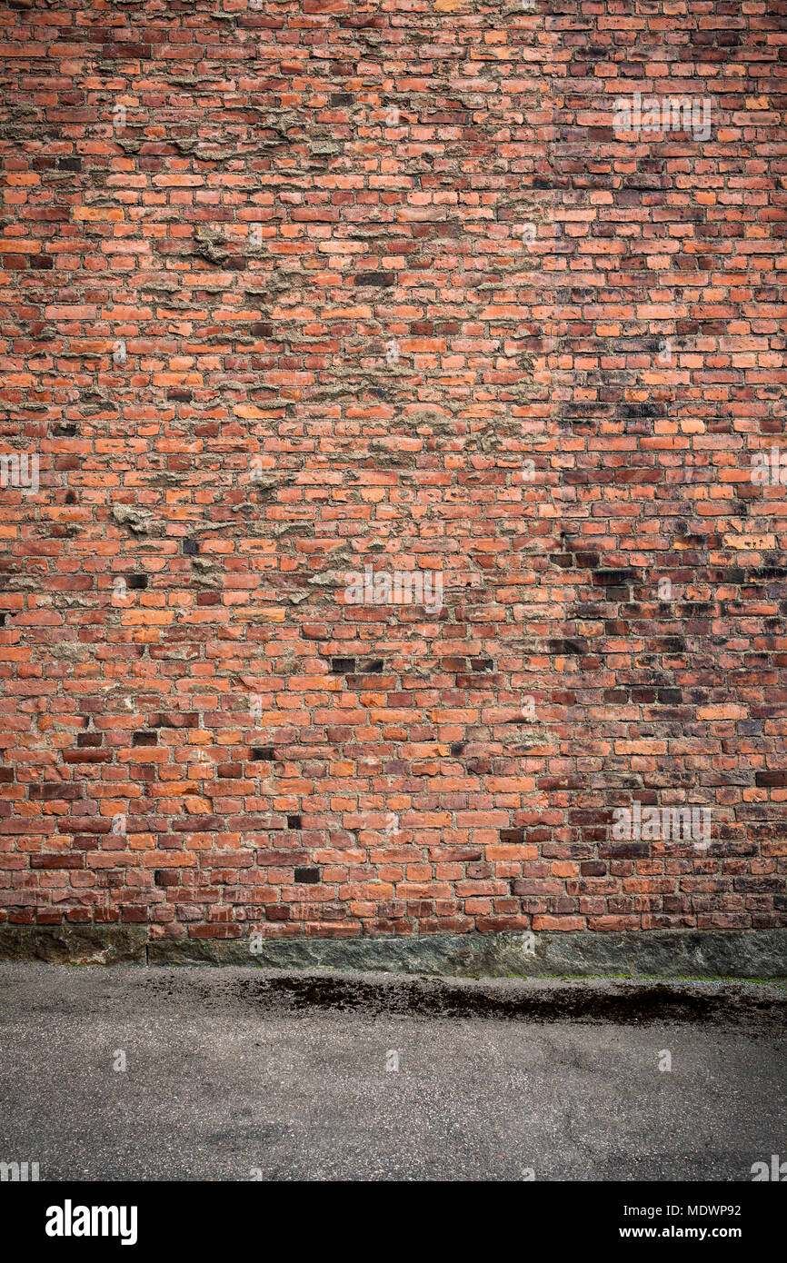 Old messy brick wall texture background exterior Stock Photo - Alamy