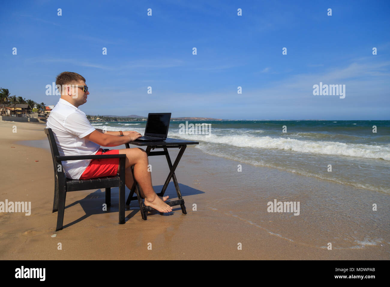 Businessman working success beach vacation hi-res stock photography and ...