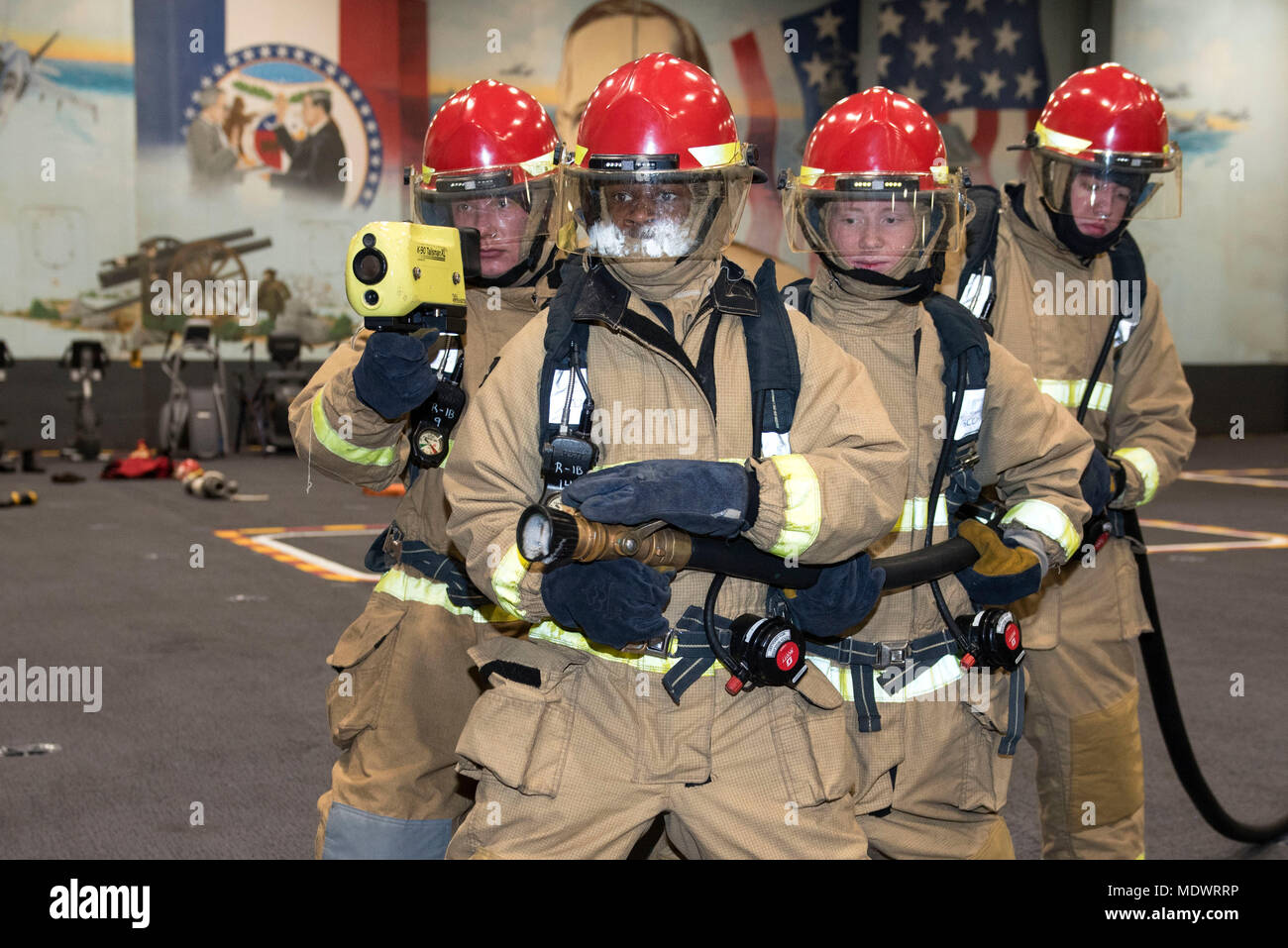 Firefighting hose handling techniques hi-res stock photography and ...