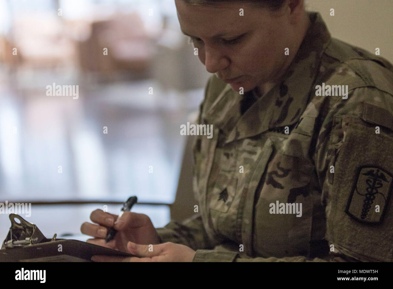 A soldier from the Walter Reed Army Institute of Research participate ...