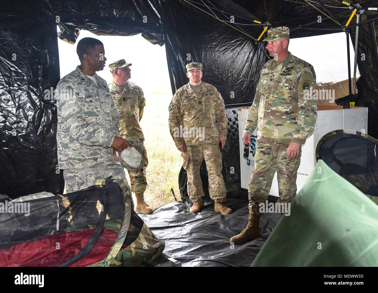 U.S. Air Force Lt. Col. Eric Yarrell (left), Joint Task Force-Bravo ...