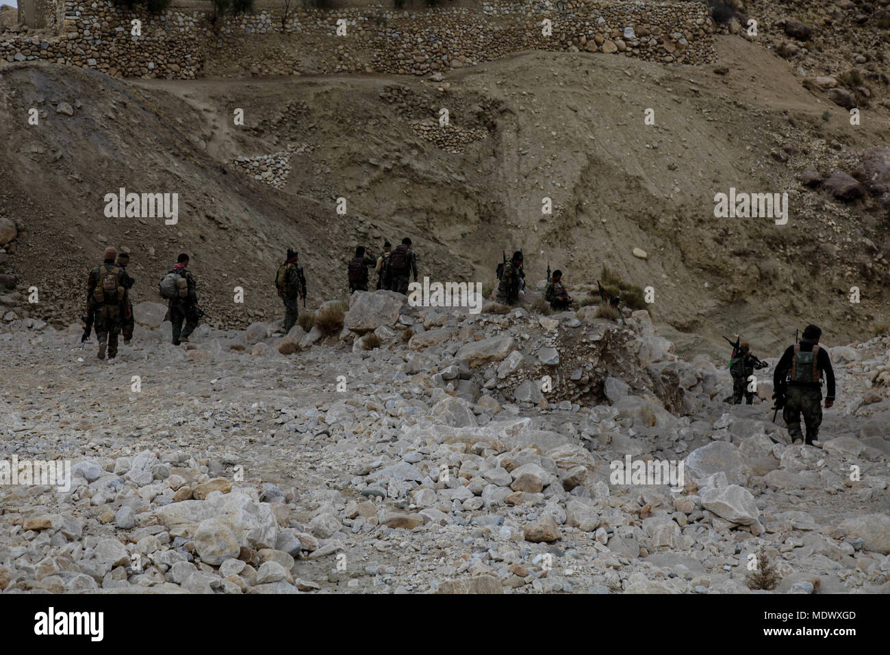 8th Special Operations Kandak Commandos conduct a clearing operation ...