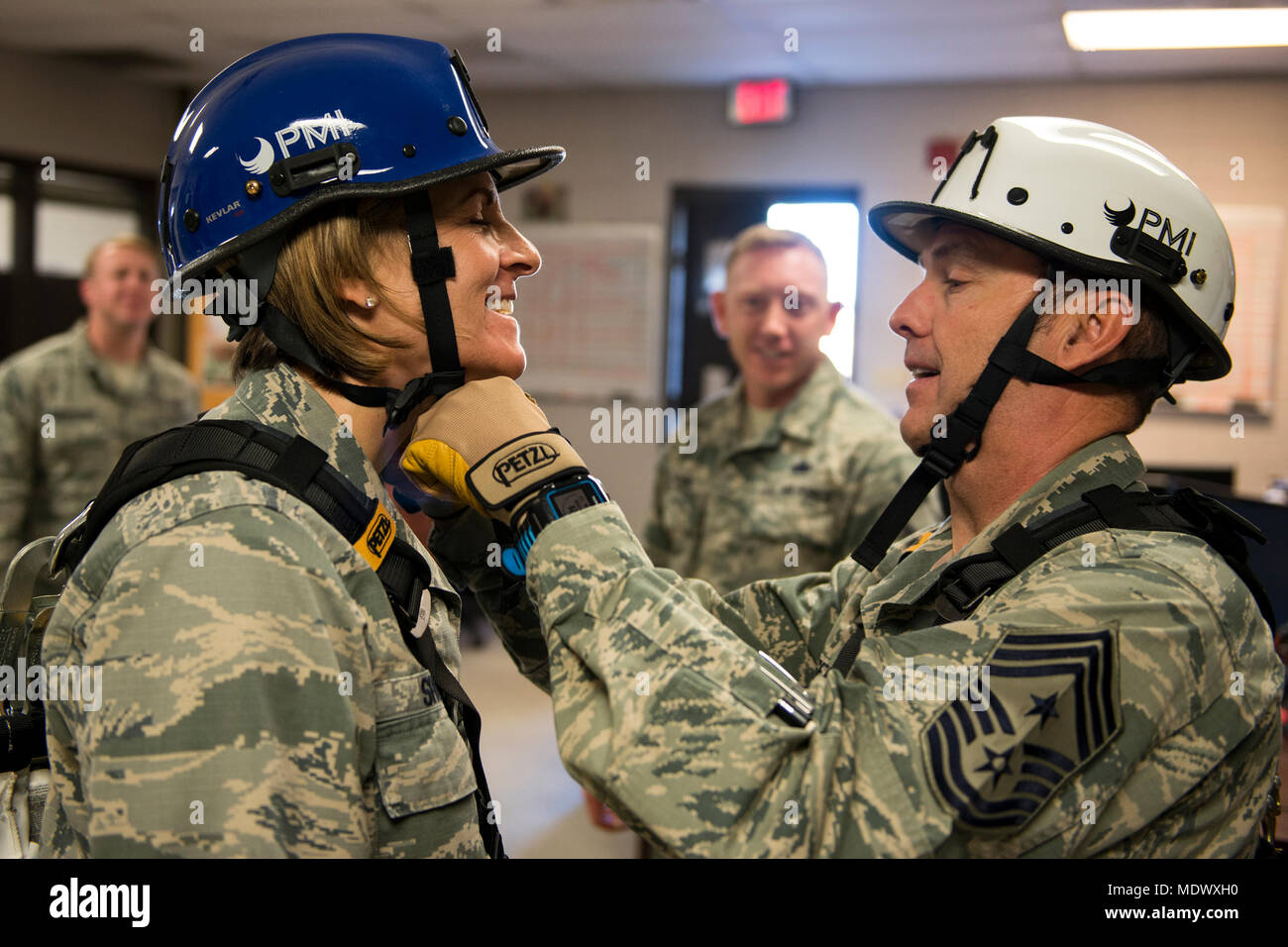 Chief Master Sgt. Jarrod Sebastian, right, 23d Wing command chief ...