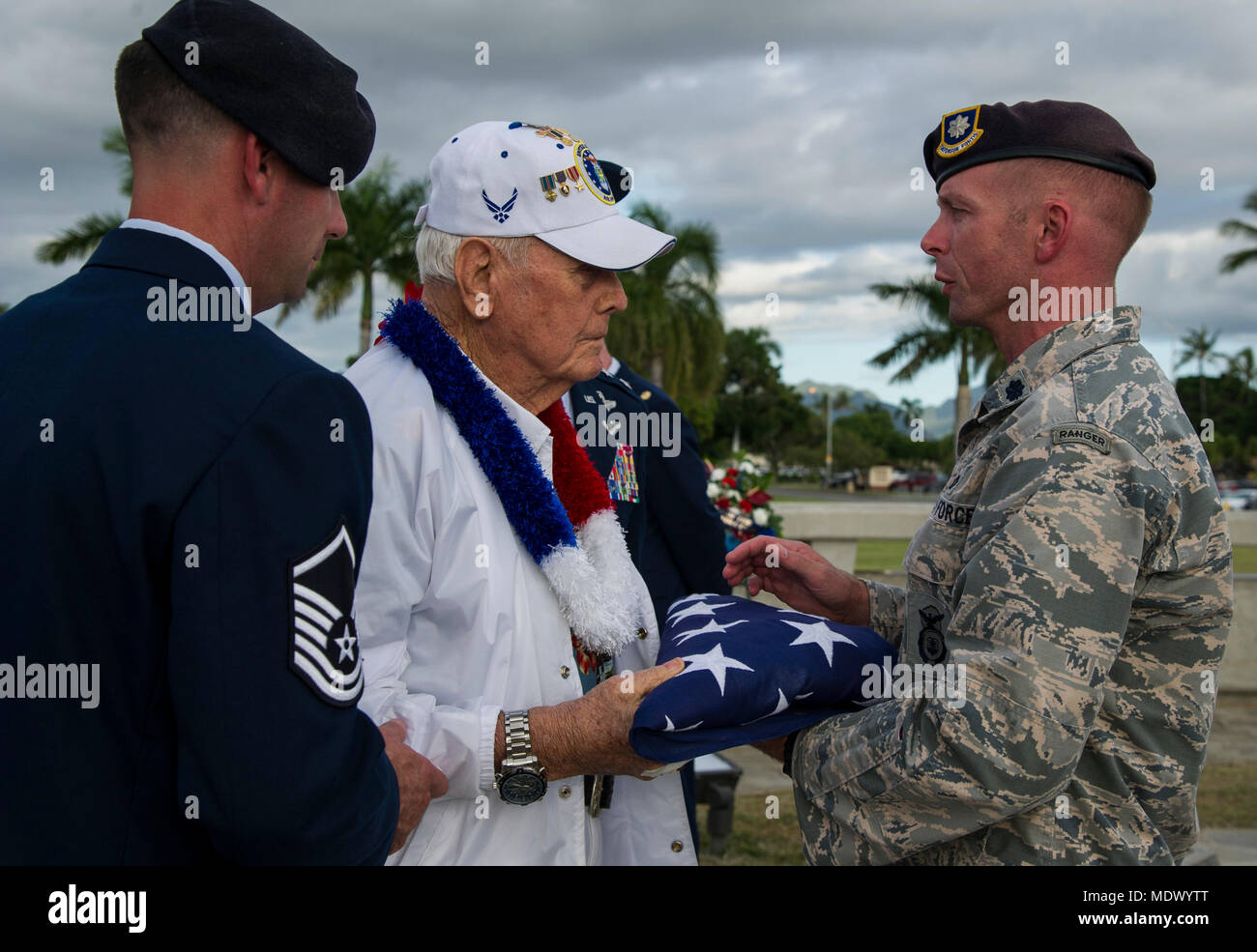 Lt. Col. Walter Sorenson, Joint Base Security commander, presents the U ...