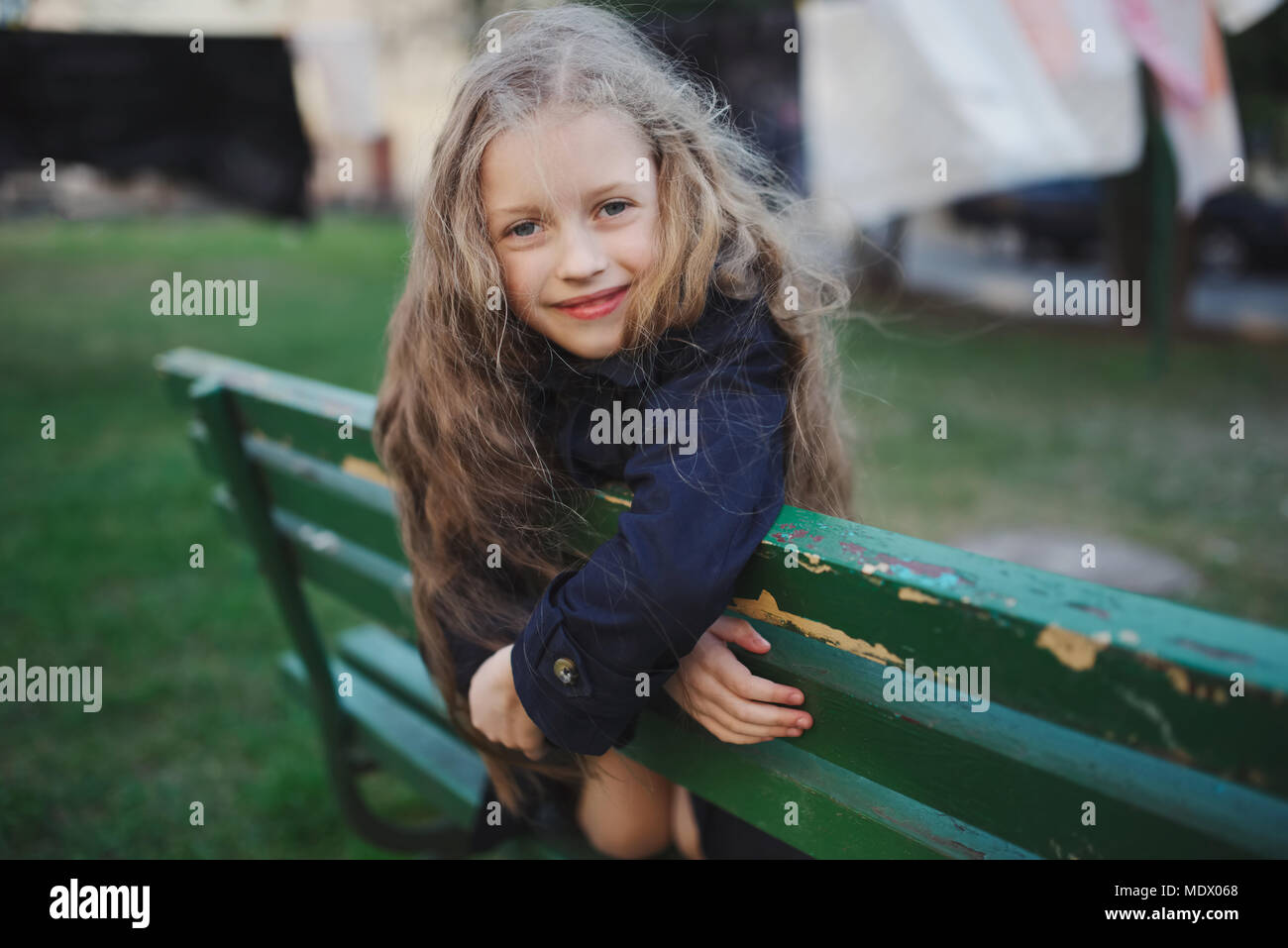 portrait of young girl in black coat Stock Photo - Alamy