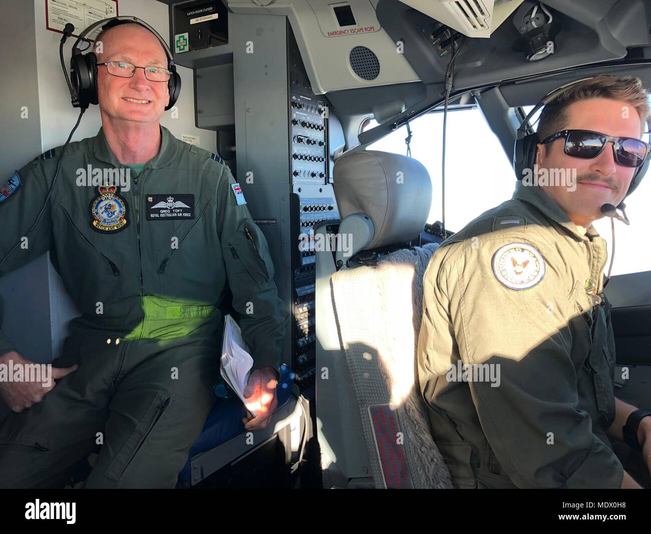 QUEENSLAND, Australia (Dec. 1, 2017) Lt. j.g. Mike McCormick, right ...
