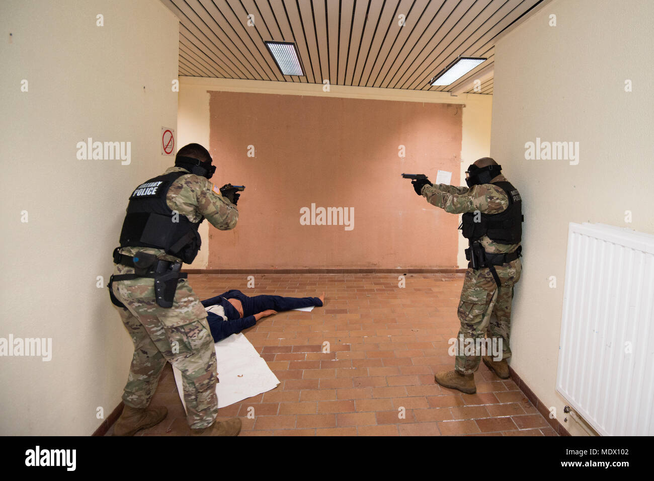 U.S. Soldiers assigned to the Provost Marshall Office at U.S. Army ...