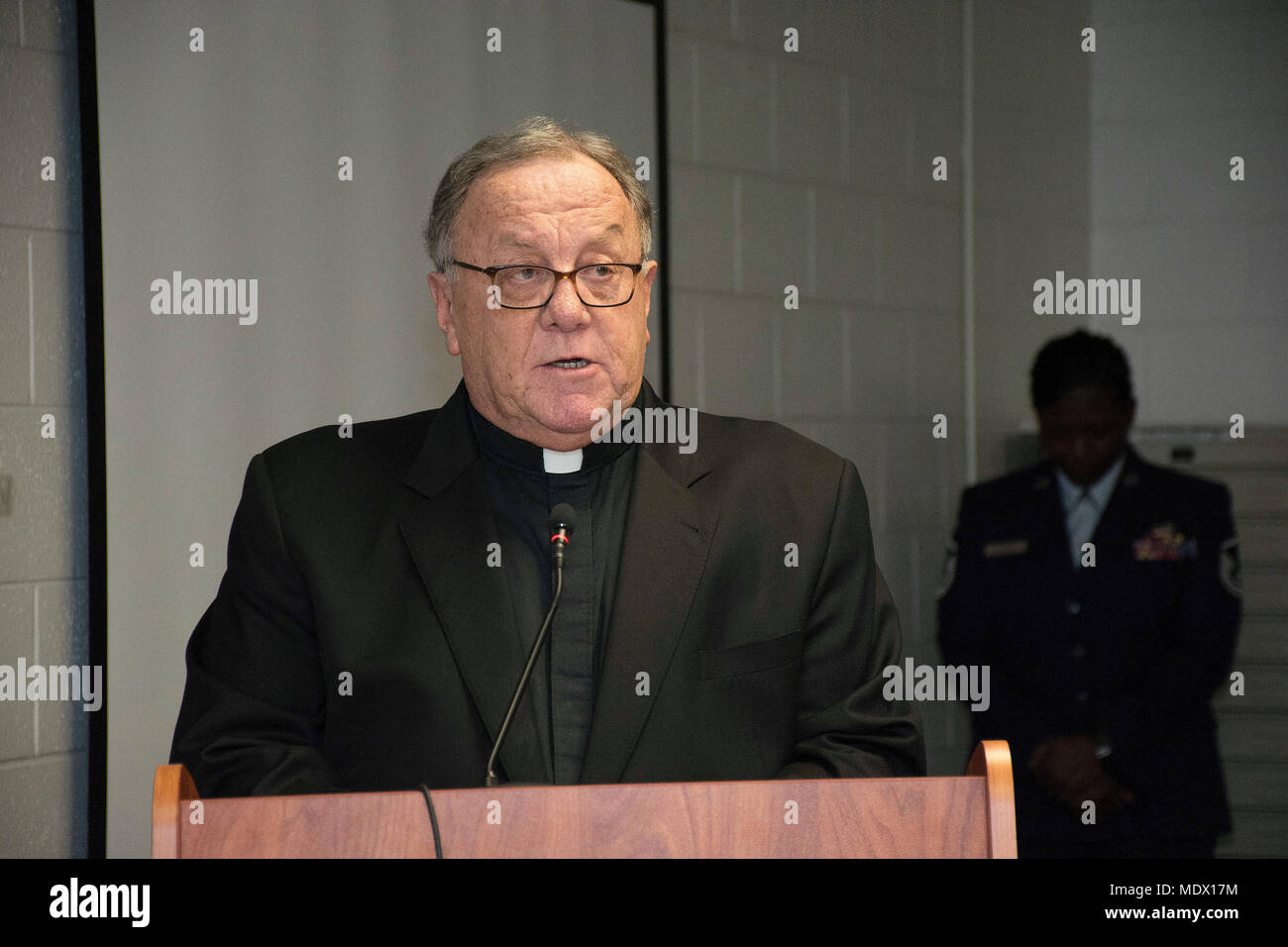 Father Jim Griffin gives the invocation at Air Force Brig. Gen ...
