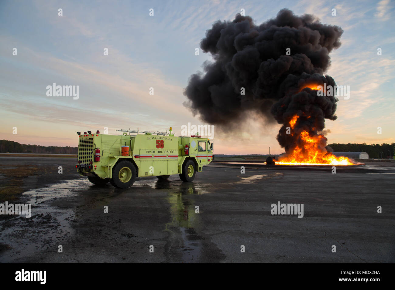 U.S. Marines with Aircraft Rescue and Firefighting (ARFF), respond to a ...