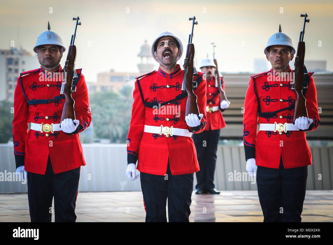 Iraqi security forces conduct a wreath laying ceremony at the Tomb of ...