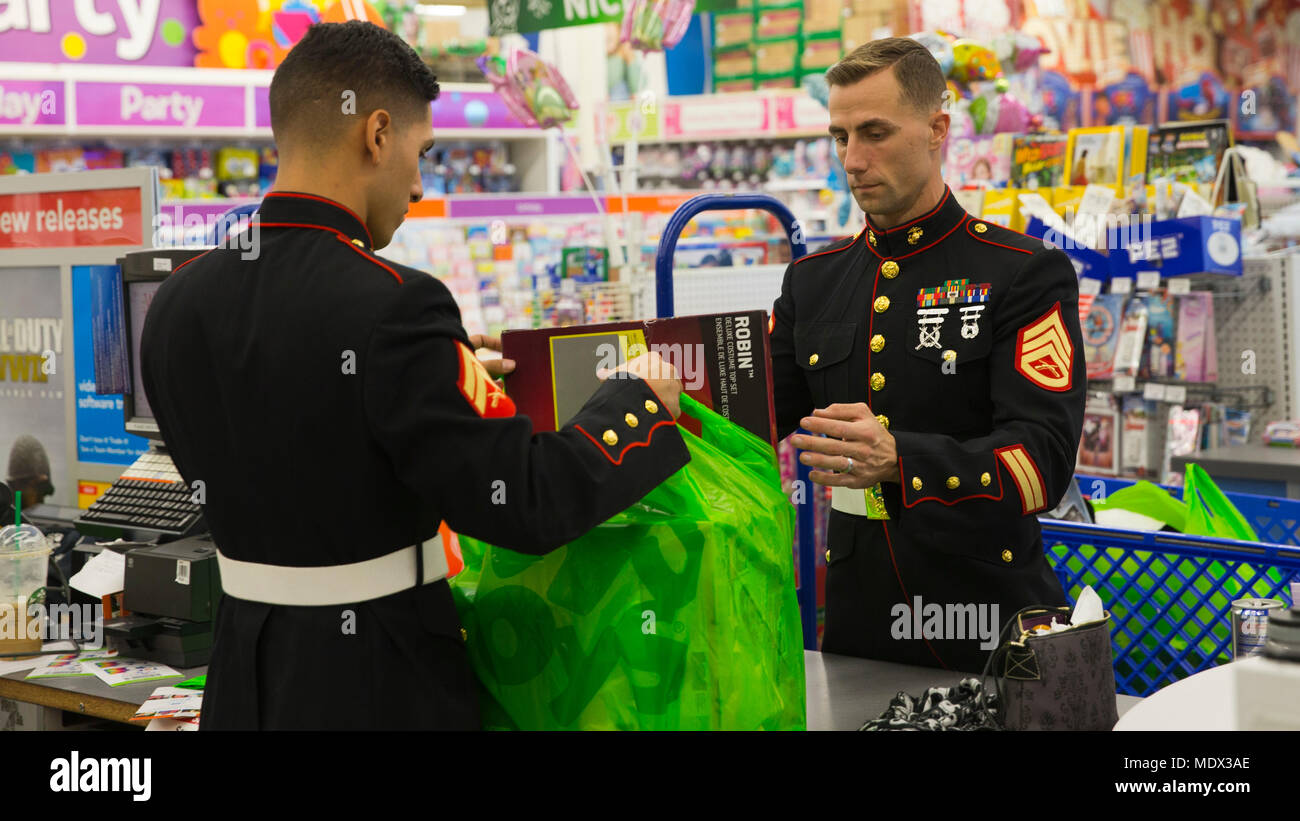 Staff Sgt. Edward Underwood and Cpl. Nicholas Martinez, military police ...