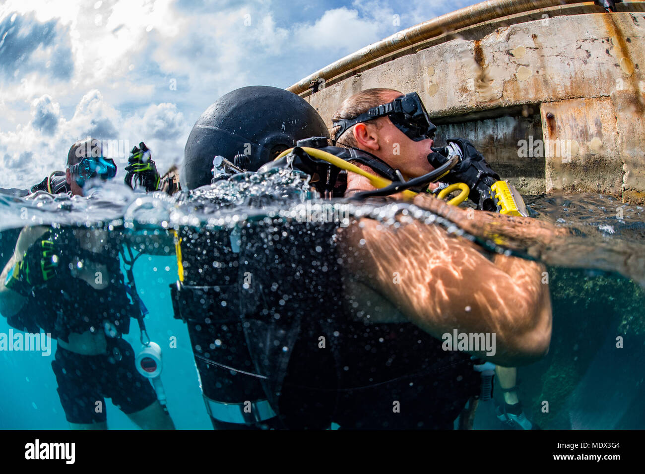 U.S. Navy Diver 3rd Class Ryan Doherty and Navy Diver 2nd Class Paul ...