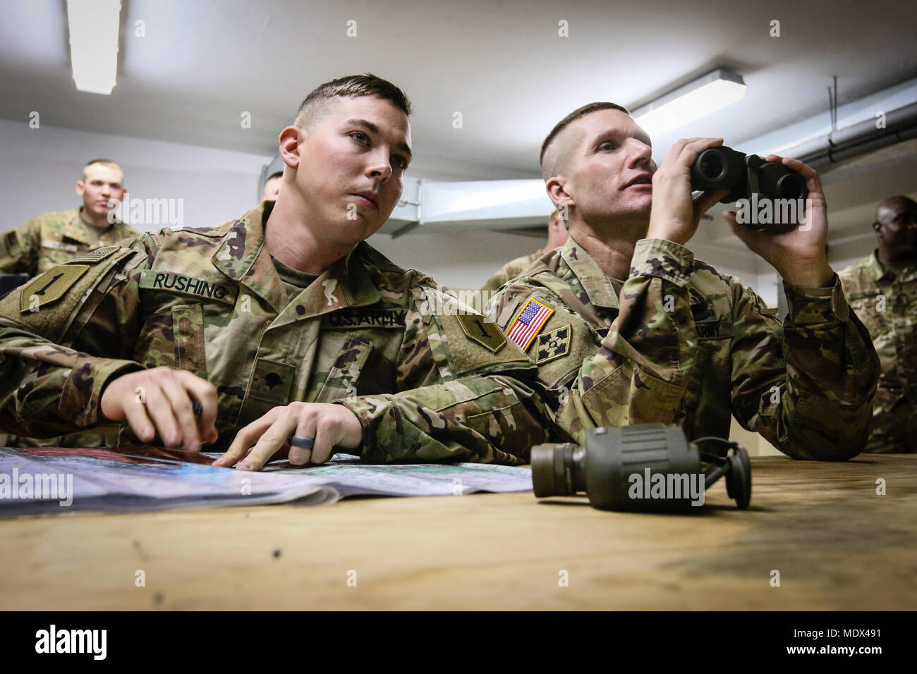 Spc. Garrett Rushing (left), an Alton, Ill. native and a fire support ...