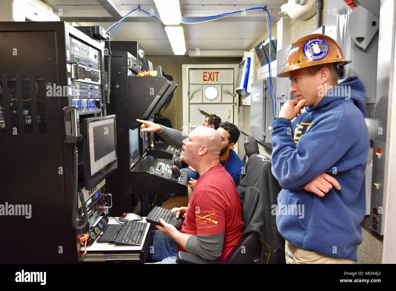 Members of the Phoenix International team and Lt. Cmdr. Eric Brege ...