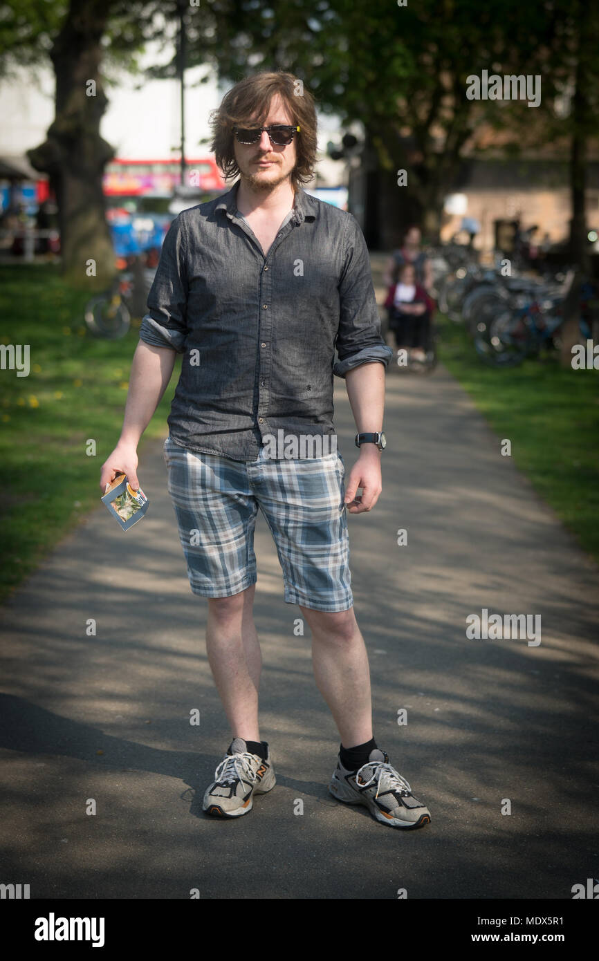 Dan Bell poses for photos as part of a series showing men wearing ...