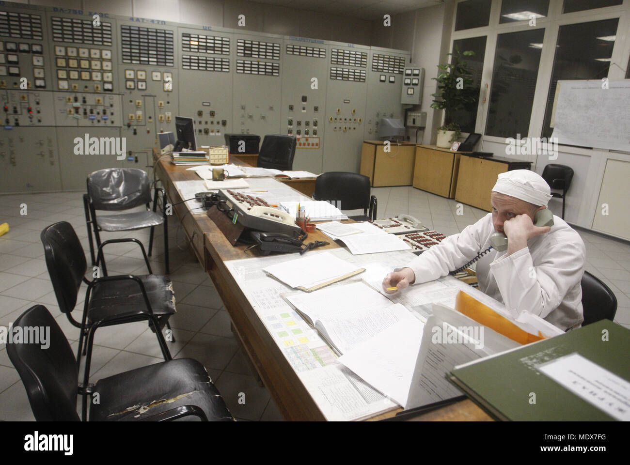 Kiev, Ukraine. 20th Apr, 2018. A worker speaks by a phone in a central ...