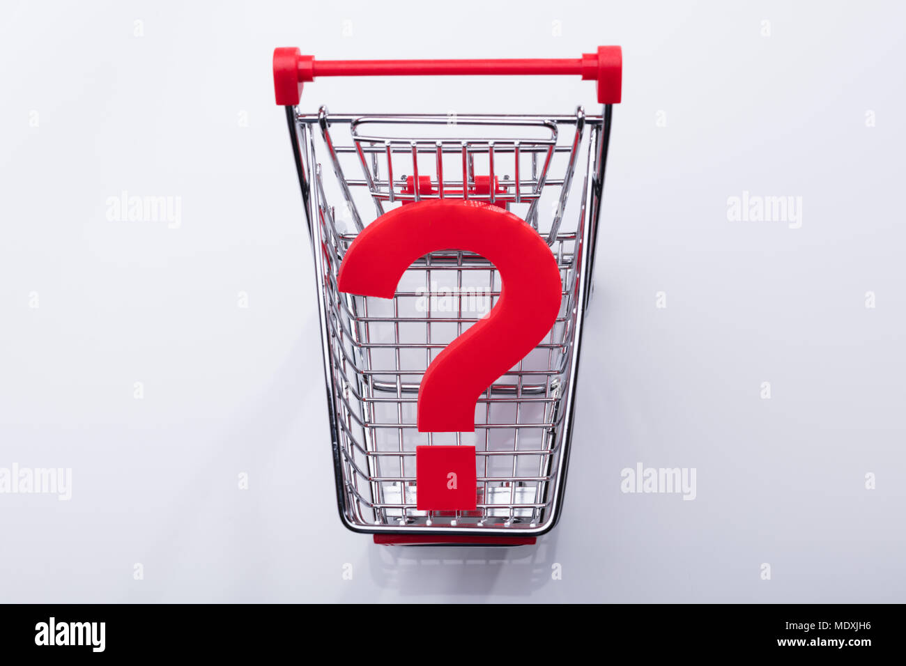 High Angle View Of Shopping Cart With Red Question Mark Sign Stock ...