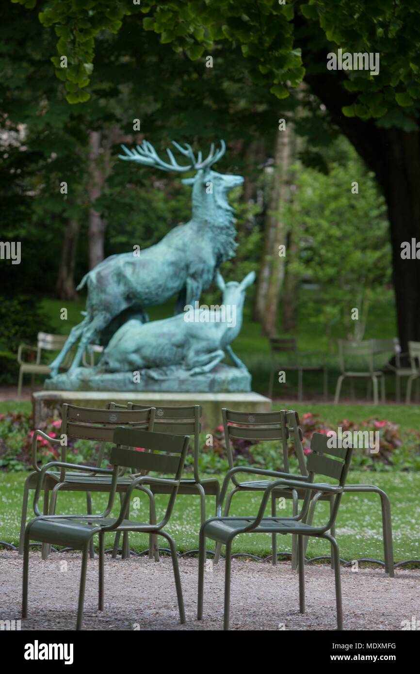 Paris, Jardin du Luxembourg, chairs and sculpture of a deer Stock Photo ...