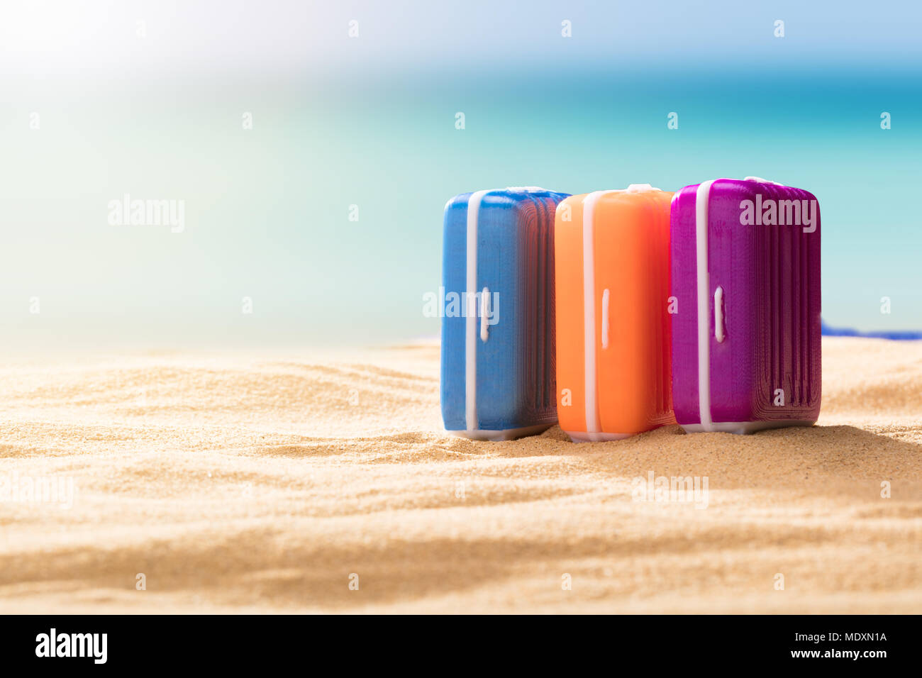 Multi colored suitcase hi-res stock photography and images - Alamy
