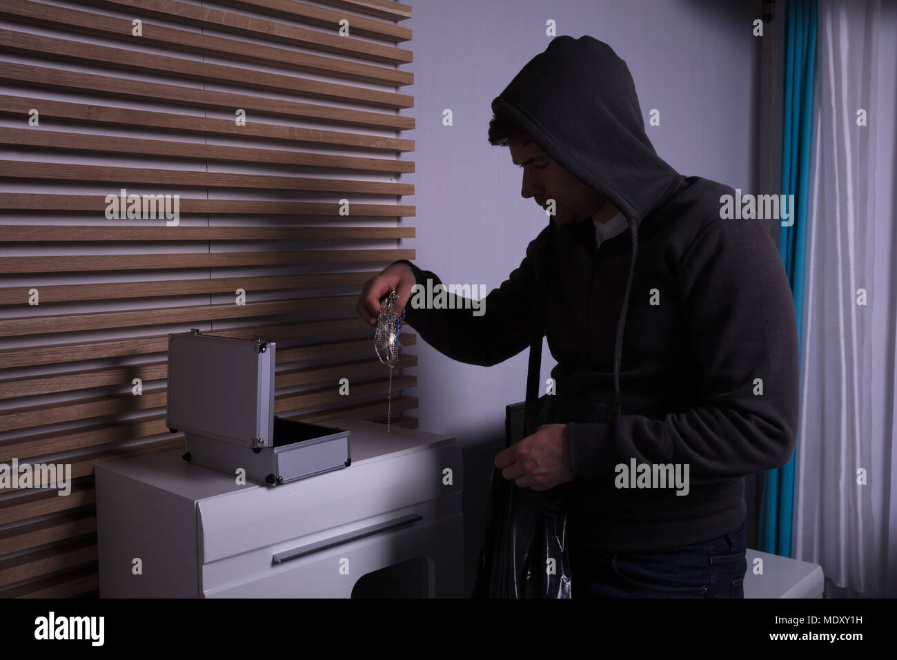 One person standing living room hi-res stock photography and images - Alamy