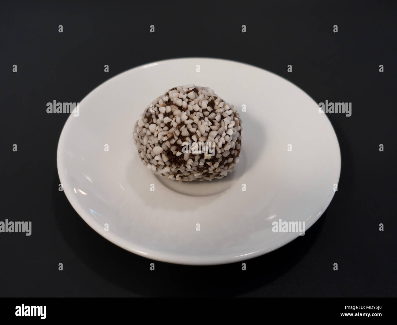 A tasty chocolate ball as dessert on a café Stock Photo - Alamy