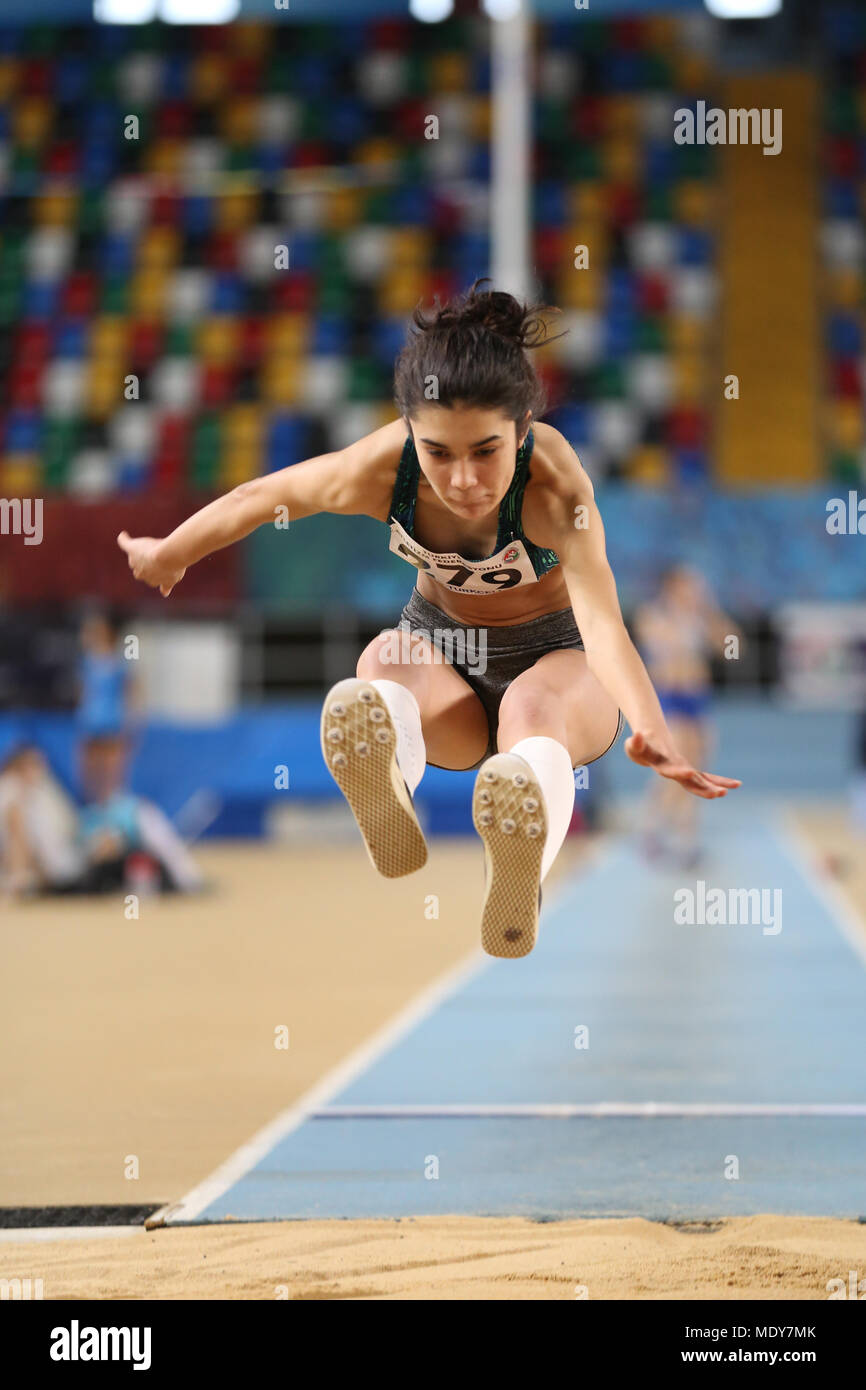 ISTANBUL, TURKEY - JANUARY 07, 2018: Undefined athlete long jumping ...