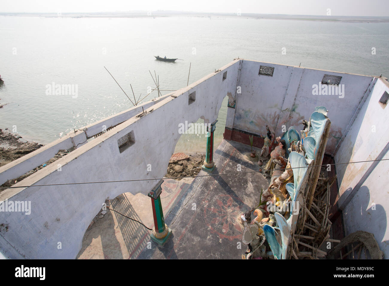 MUNSHIGONJ, BANGLADESH - JANUARY 24 : A hindu devotee's temple going ...
