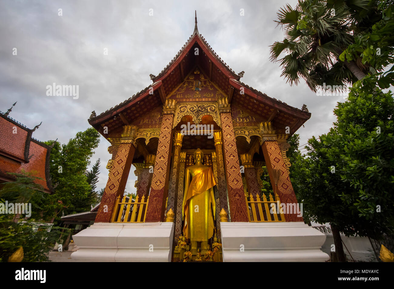 Laos temple statue gold buddha hi-res stock photography and images - Alamy