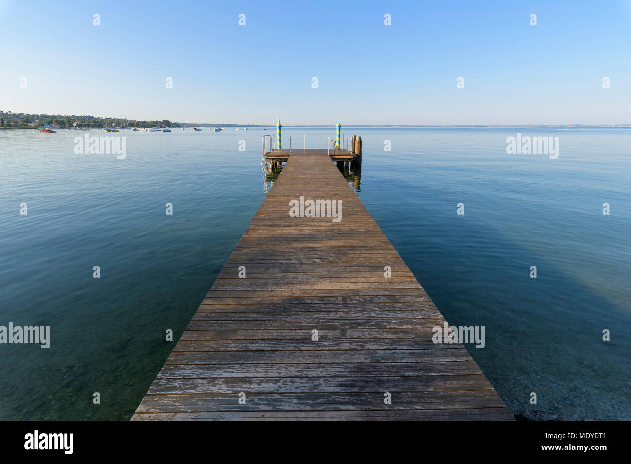 Symmetrical view of jetty on lake hi-res stock photography and images ...