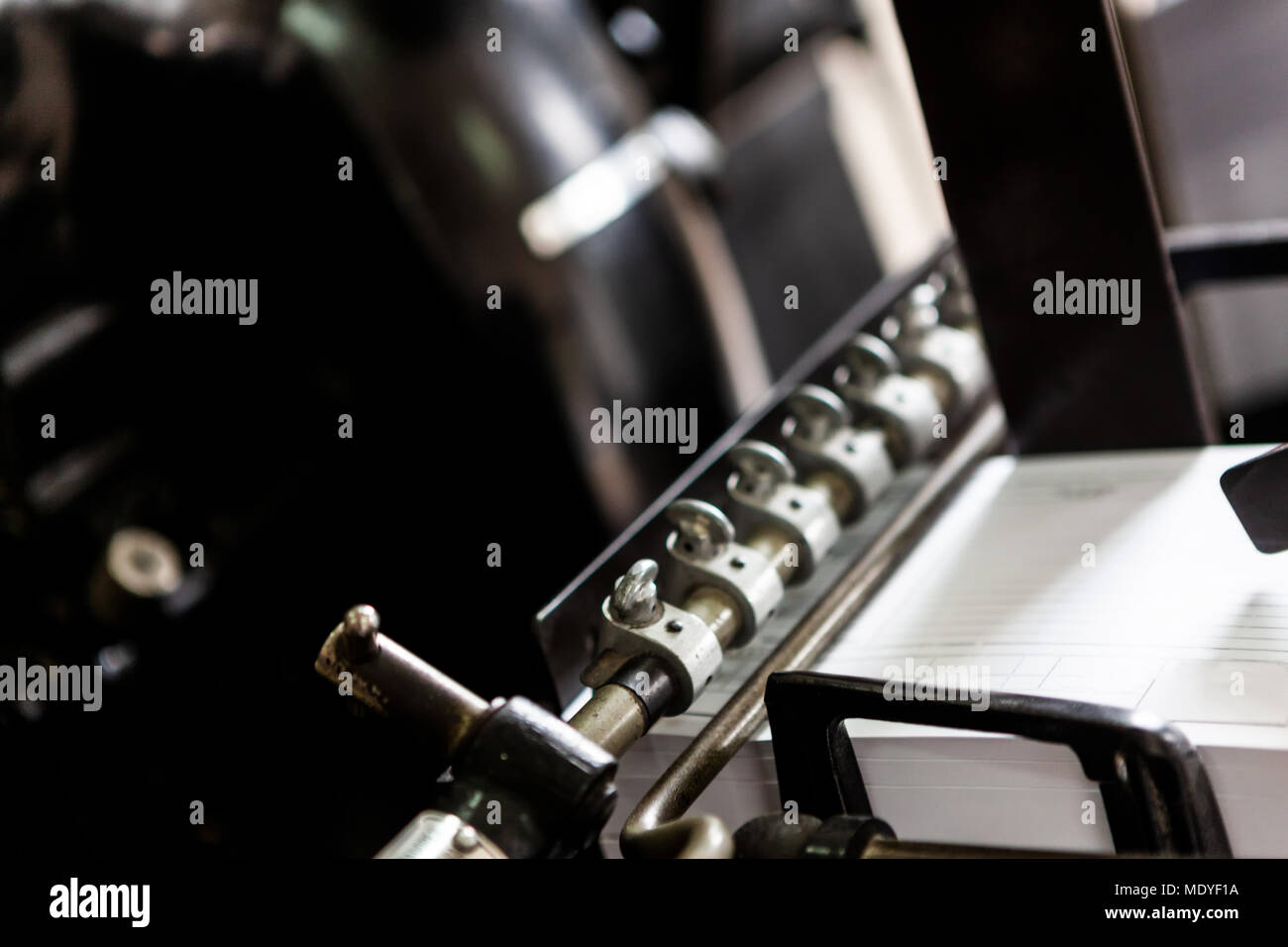 Old printing machine working Stock Photo - Alamy
