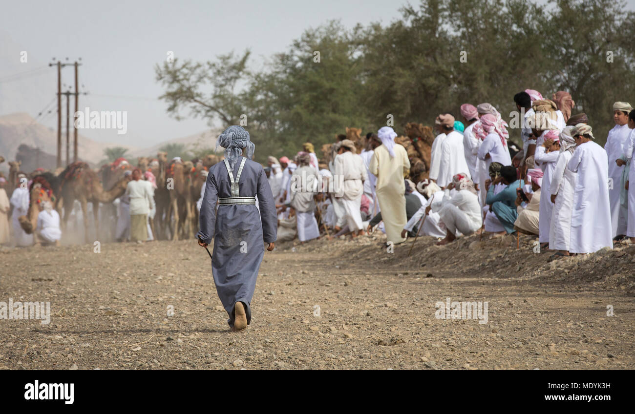 Omani man walking hi-res stock photography and images - Alamy