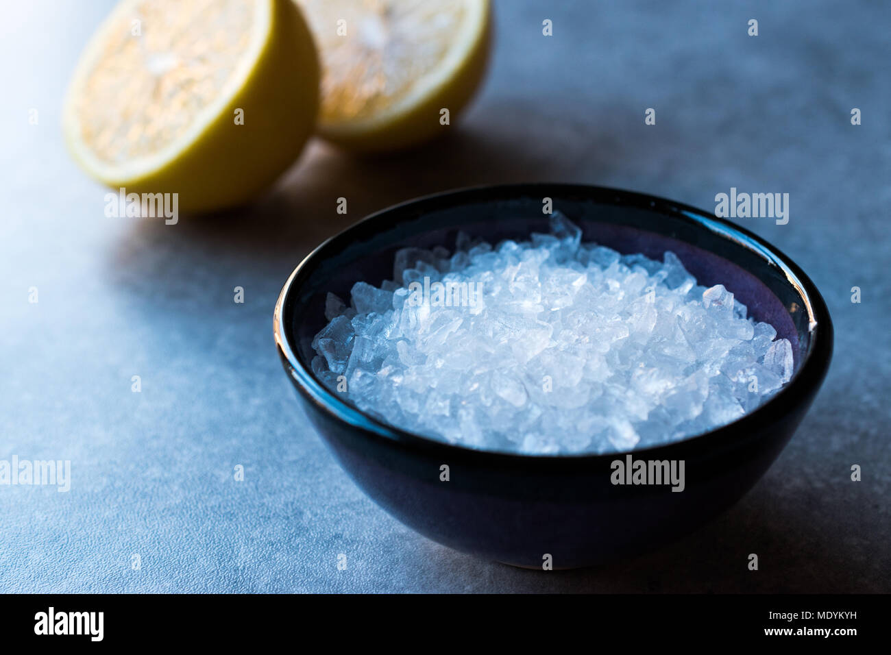 Lemon Sea Salt Crystals on Blue Surface. Organic Product Stock Photo ...