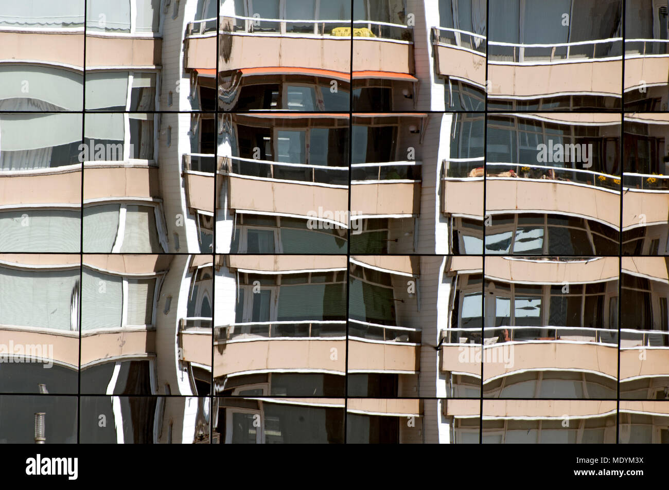 front view of an apartment building photographed in a mirror Stock ...