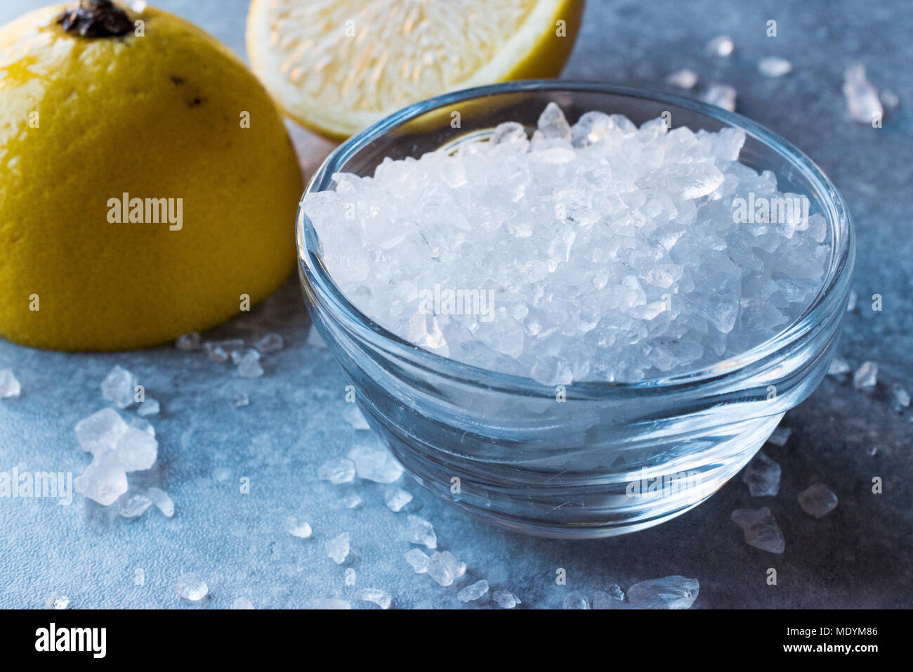 Lemon Sea Salt Crystals on Blue Surface. Organic Product Stock Photo ...