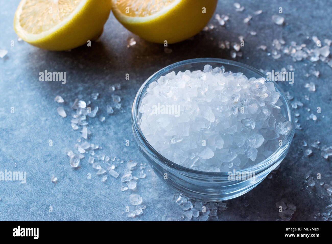 Lemon Sea Salt Crystals on Blue Surface. Organic Product Stock Photo ...