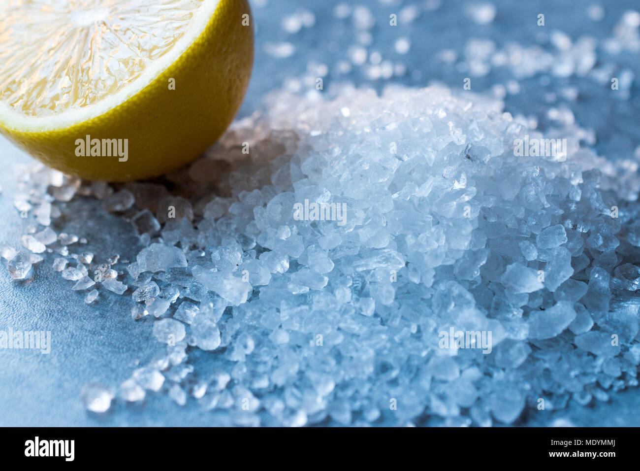 Lemon Sea Salt Crystals on Blue Surface. Organic Product Stock Photo ...
