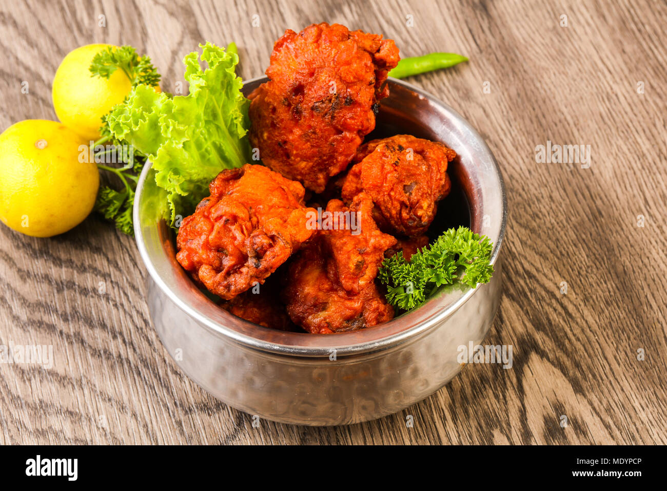 Indian traditional cuisine - Chicken lollipops with spices Stock Photo ...