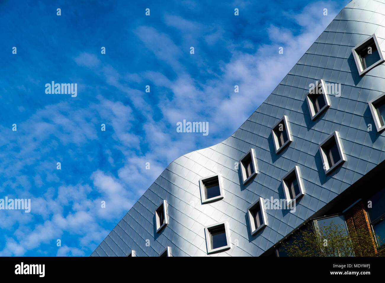 Grey wall blue sky hi-res stock photography and images - Alamy
