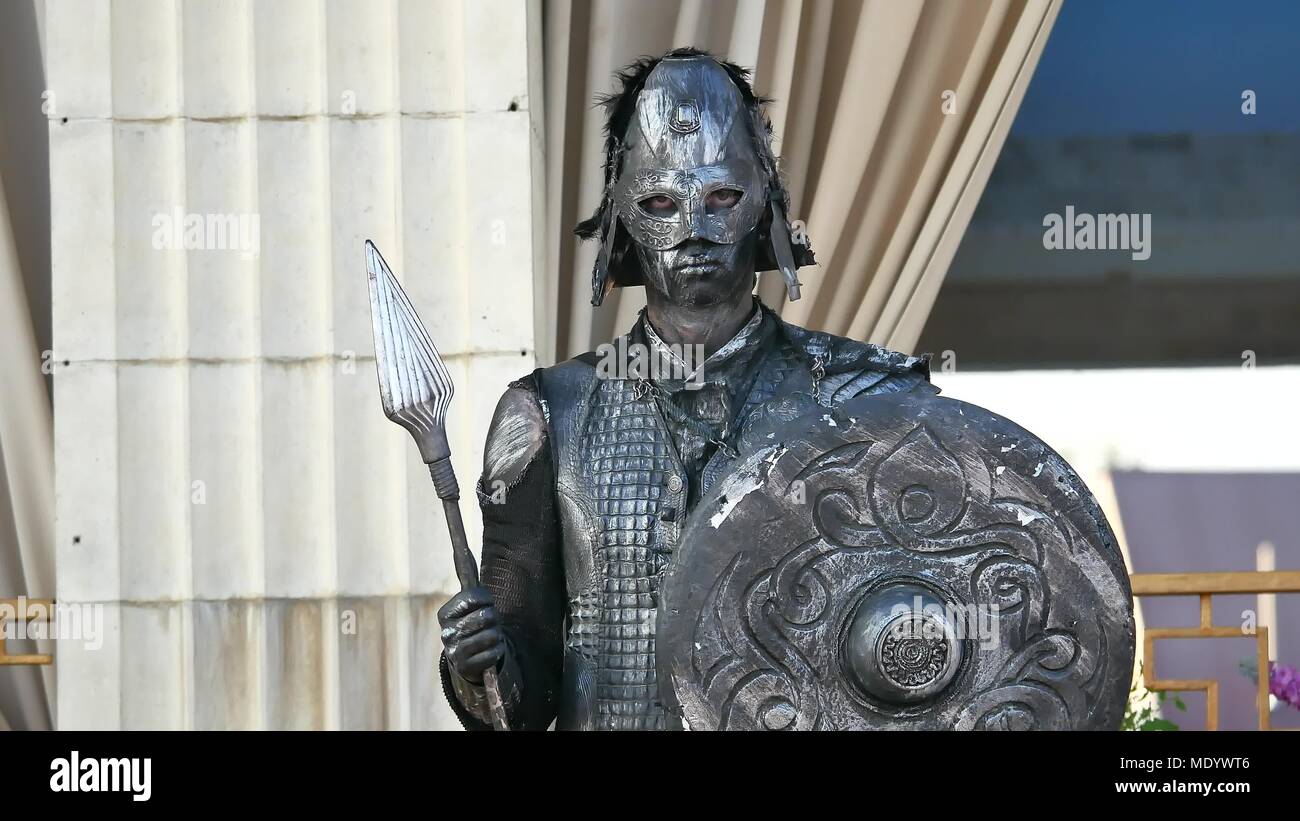 Ancient warrior or Gladiator posing over a dark background Stock Photo ...