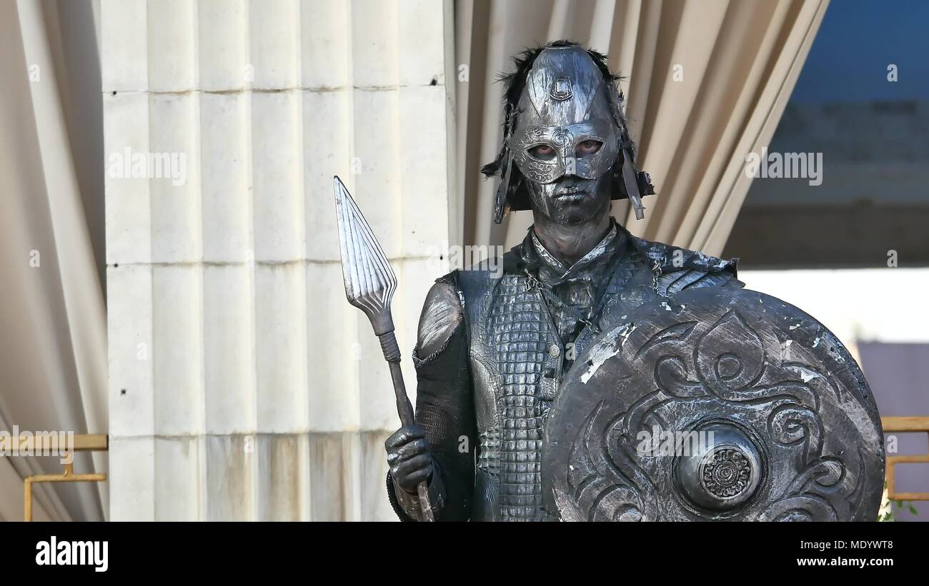 Ancient warrior or Gladiator posing over a dark background Stock Photo ...