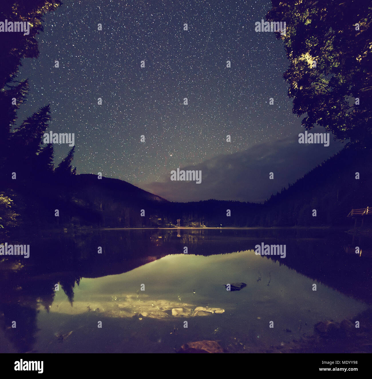 Mountain lake at night Stock Photo - Alamy