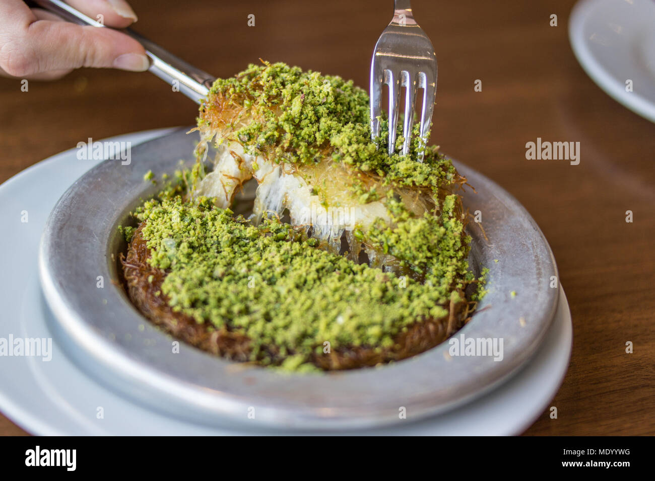 Turkish Dessert Kunefe with Pistachio Powder. Traditional Food Stock ...