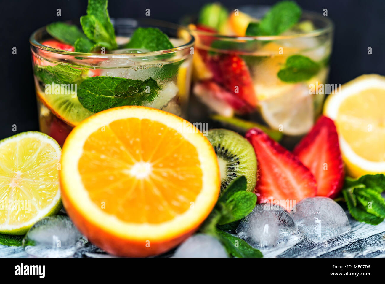Homemade lemonade with fruit and mint Stock Photo - Alamy