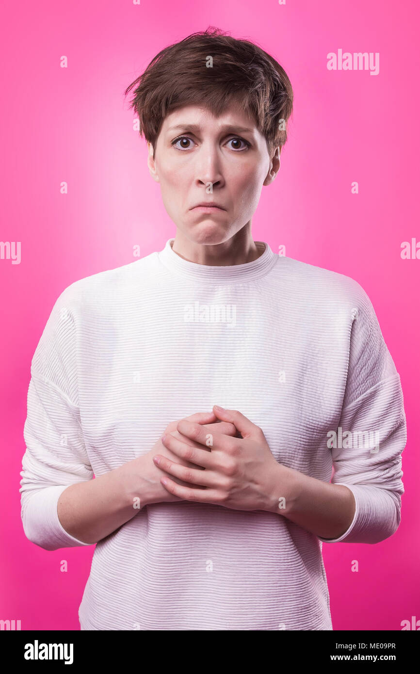 Young woman quizzical expression hi-res stock photography and images ...