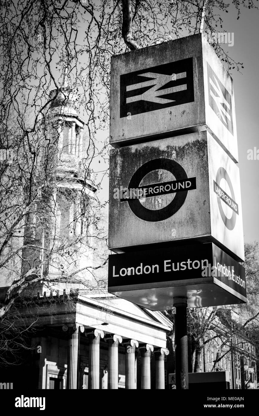 Euston Road rush hour with Euston station railway and underground signs ...