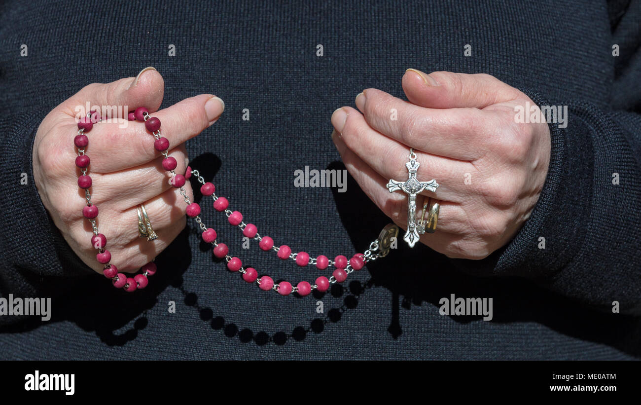 Hands prayer beads hi-res stock photography and images - Alamy